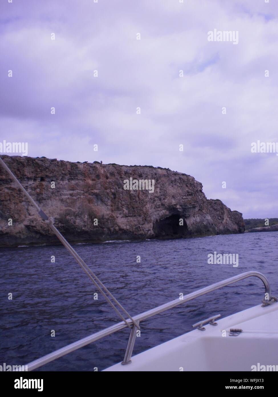 Wonderful Rock Formations Seen From A Boat In Citadel On Menorca Island ...