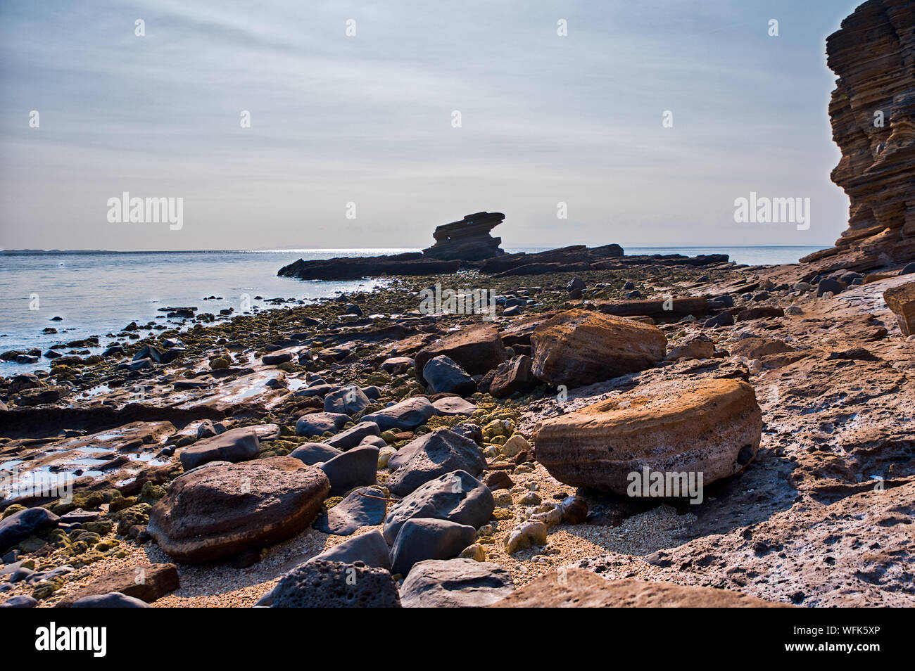 Wavy lines of rock formation of Animasola Island at Masbate ...