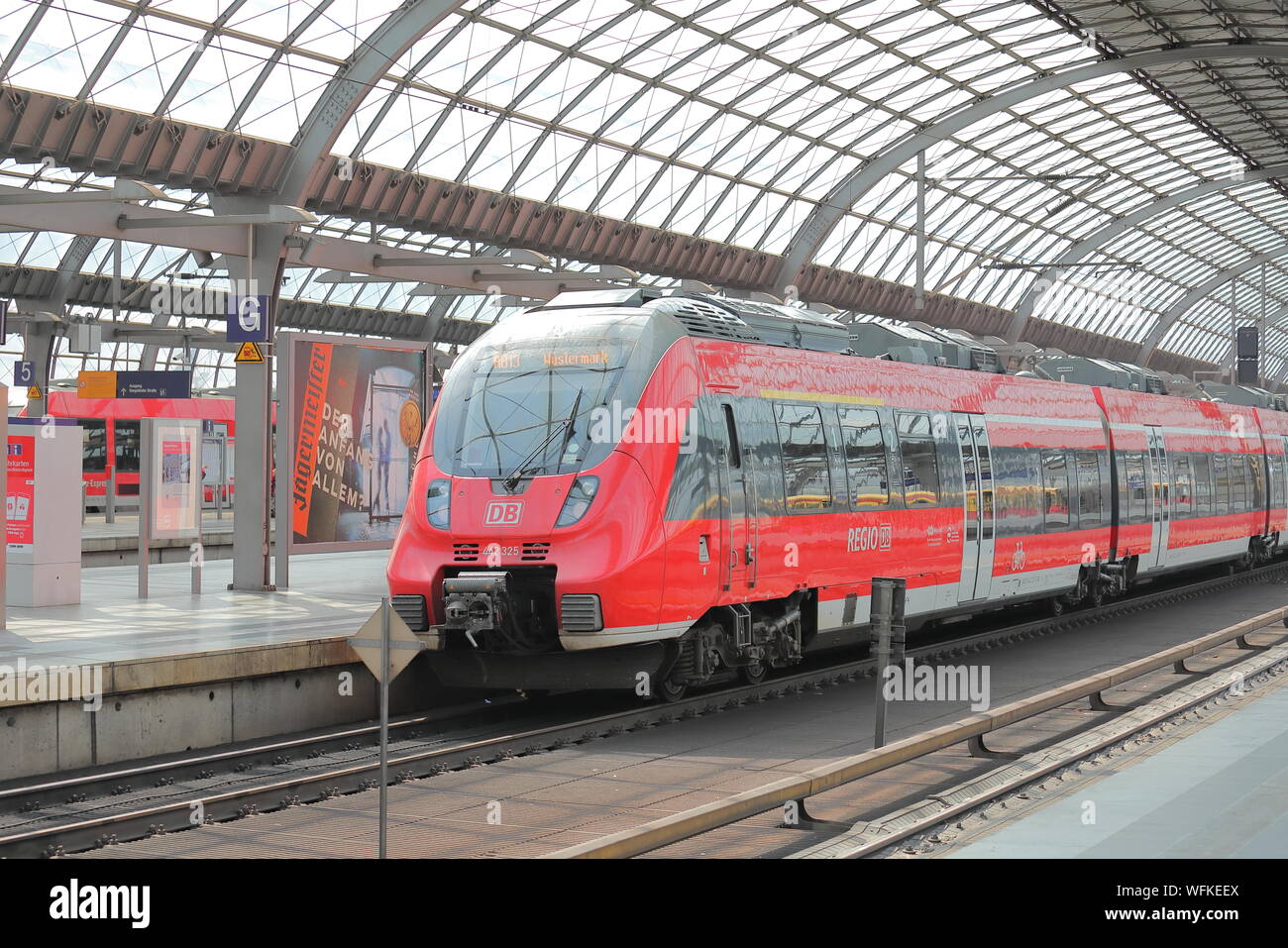 People travel by DB Deutsche Bahn train in Berlin Germany Stock Photo ...