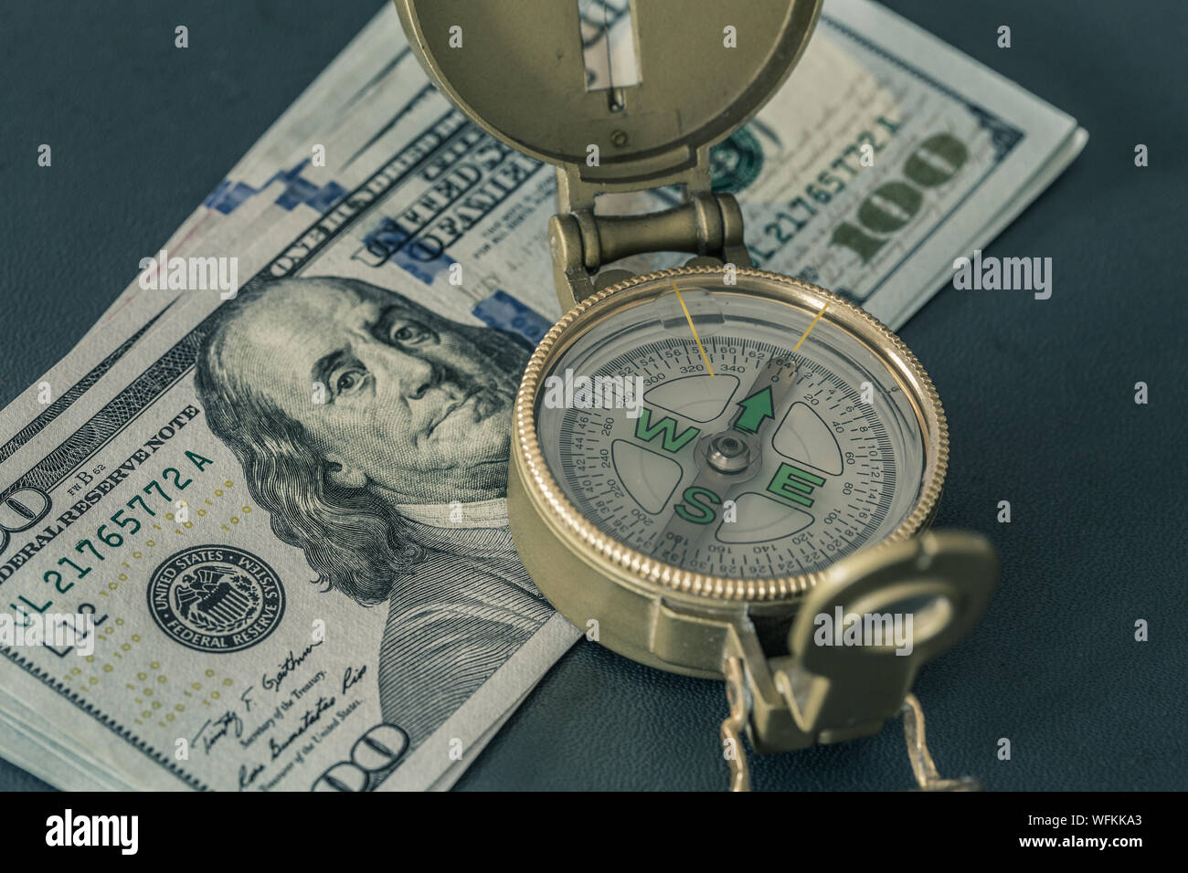 Compass Money High Resolution Stock Photography and Images - Alamy