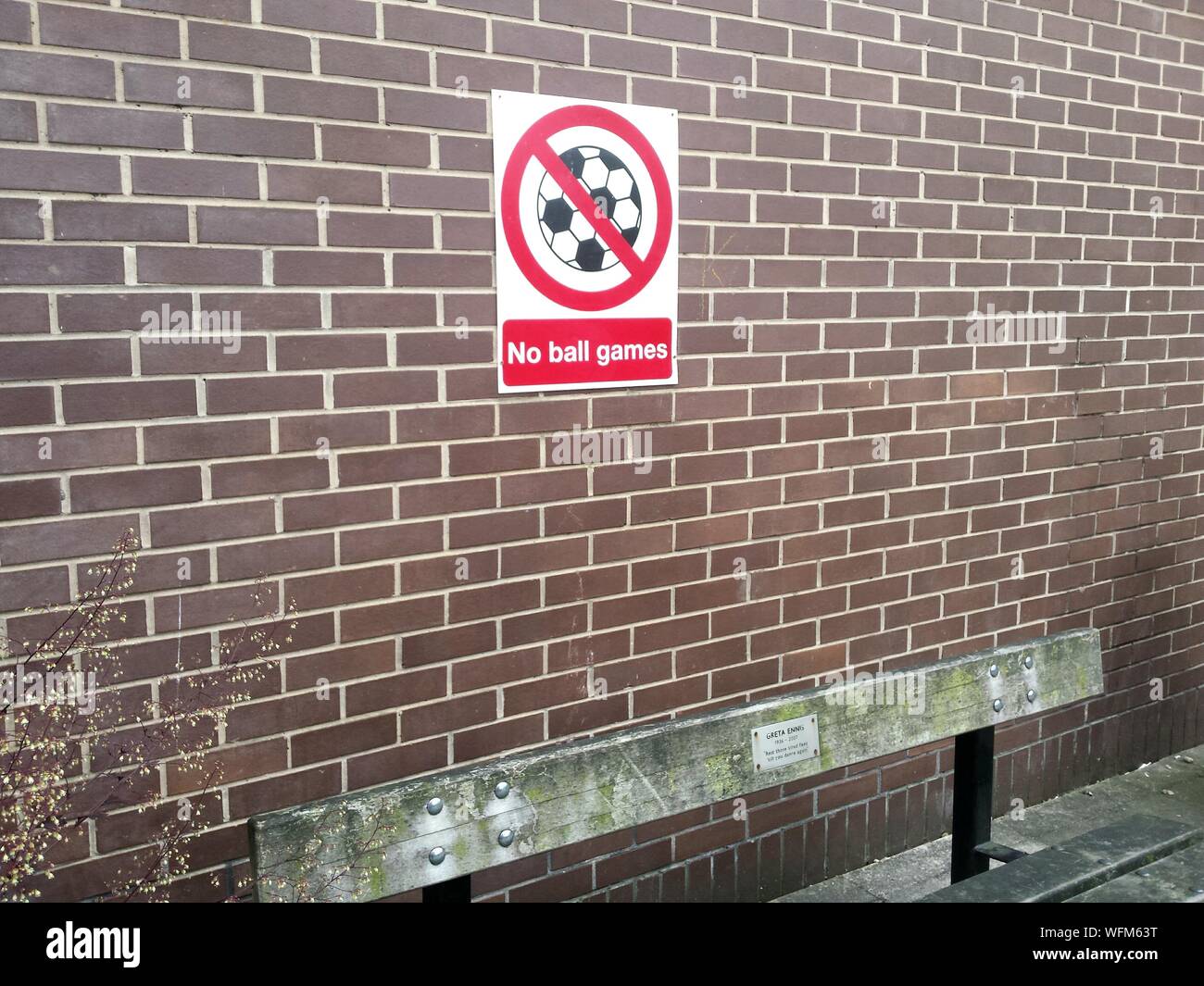 Warning Sign On Brick Wall High Resolution Stock Photography and Images ...