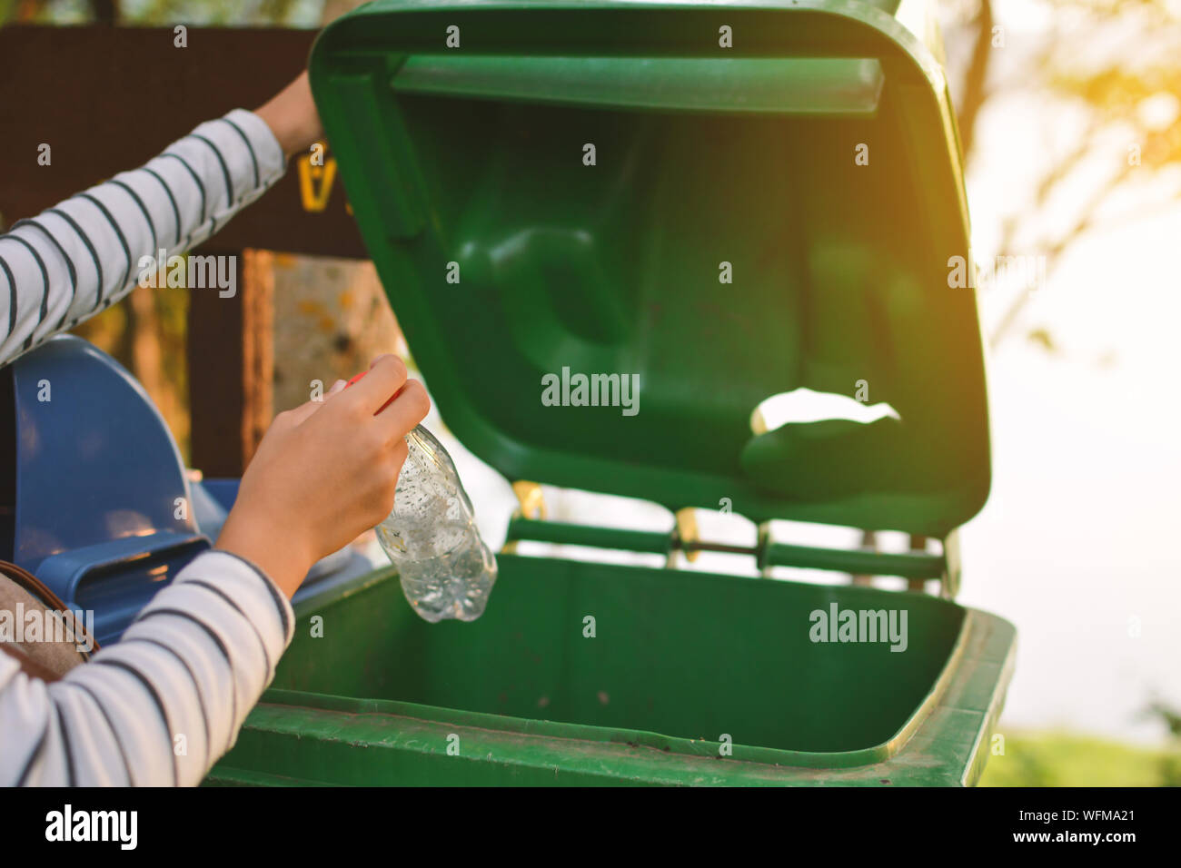 Throwing plastic bottle hi-res stock photography and images - Alamy