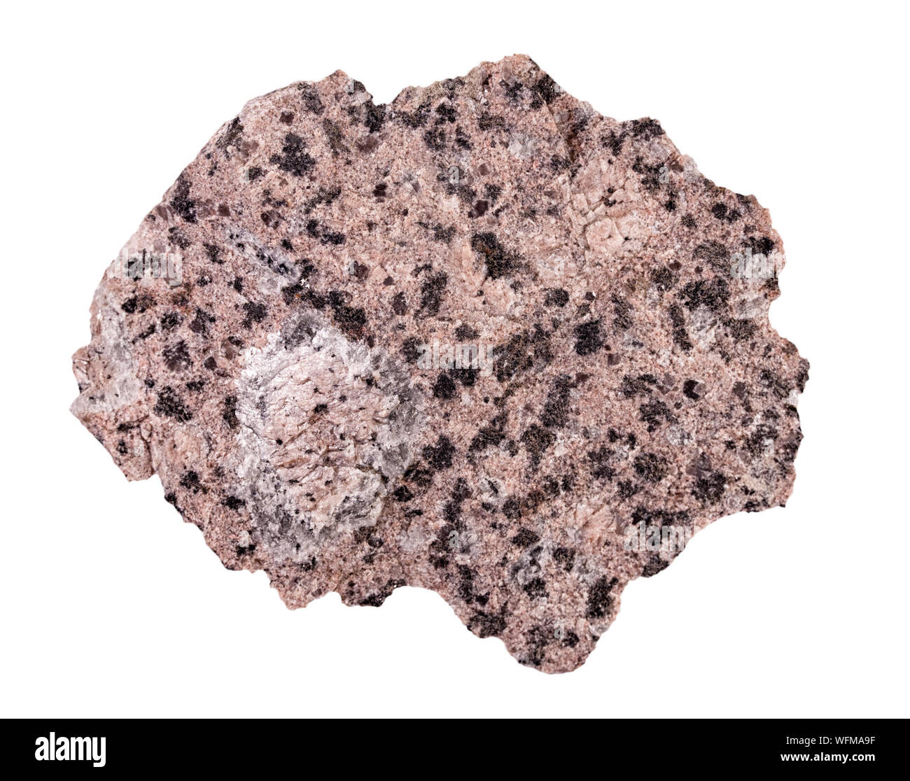 Rapakivi granite on a white background. Close up image Stock Photo - Alamy