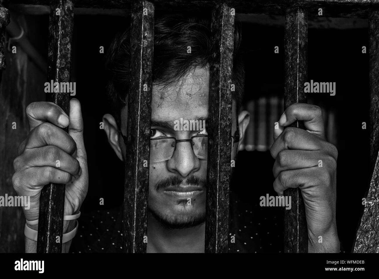Man in prison hi-res stock photography and images - Alamy