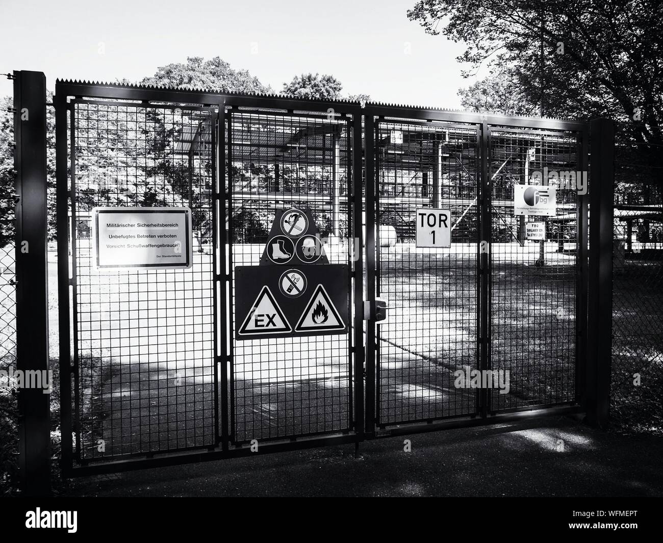 Metal gate with sign hi-res stock photography and images - Alamy