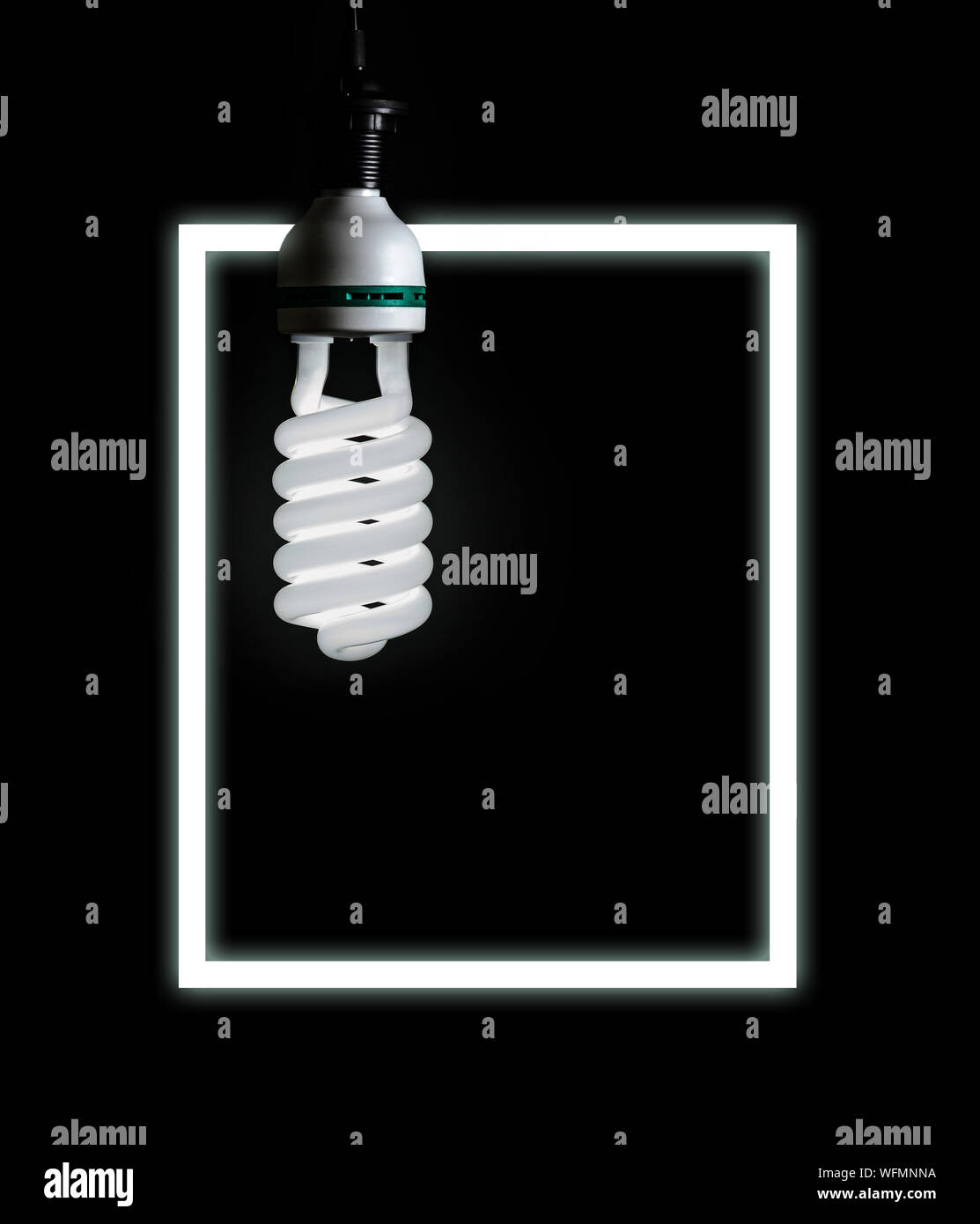 The white bulb lies on black background with neon frame Stock Photo - Alamy