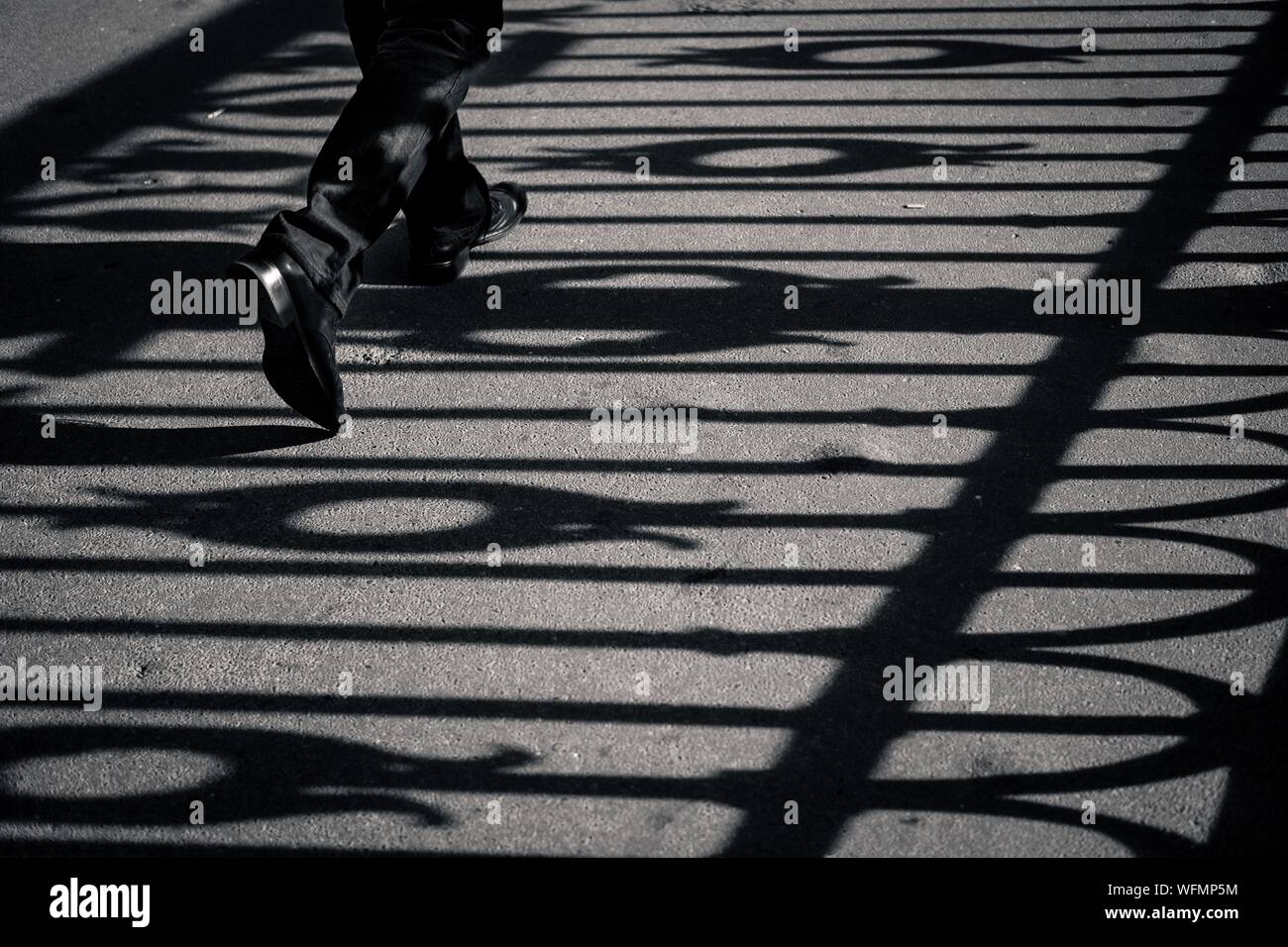 Shadow man running on street hi-res stock photography and images - Alamy