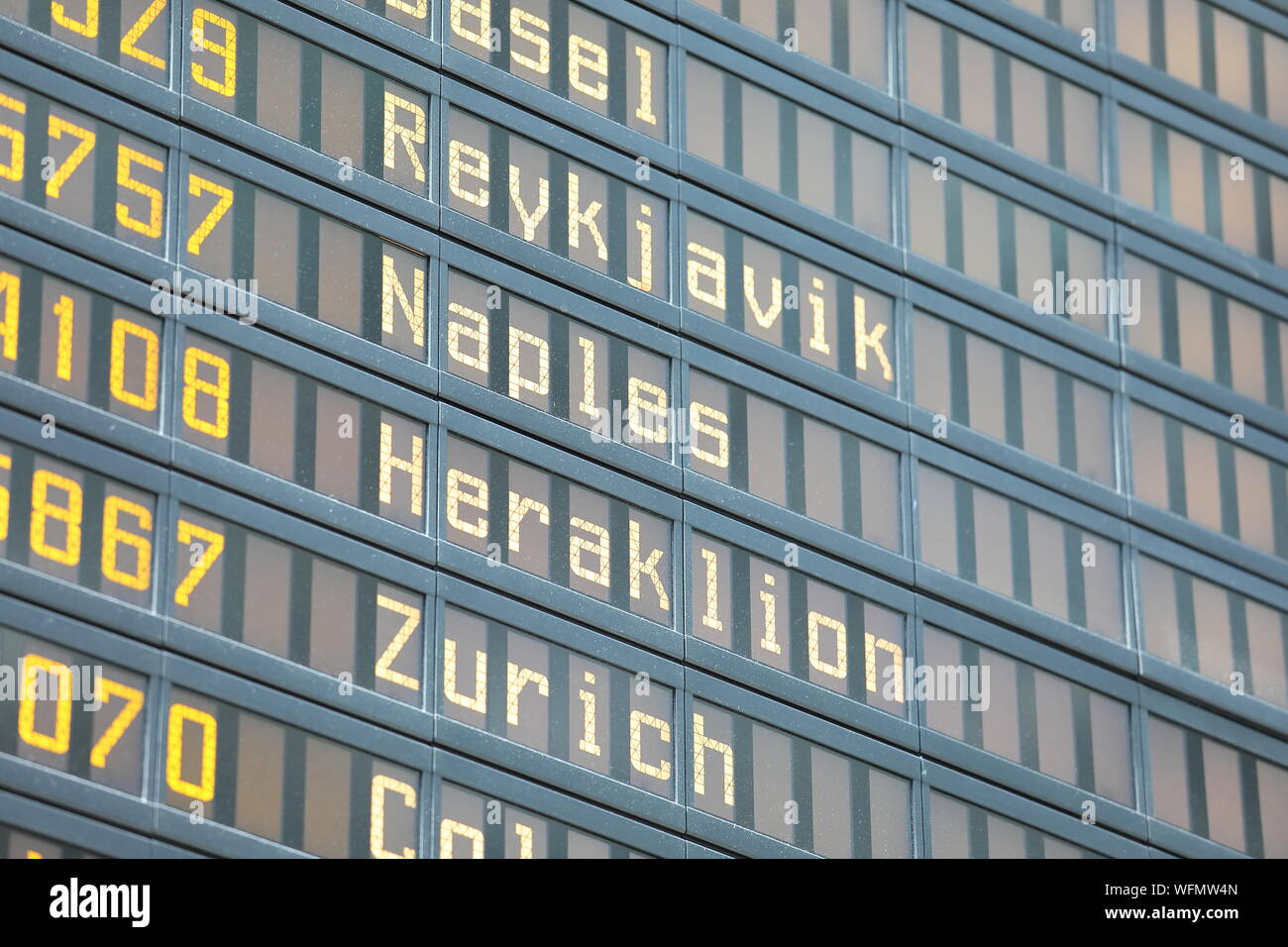 Flight departure schedule information display Stock Photo - Alamy