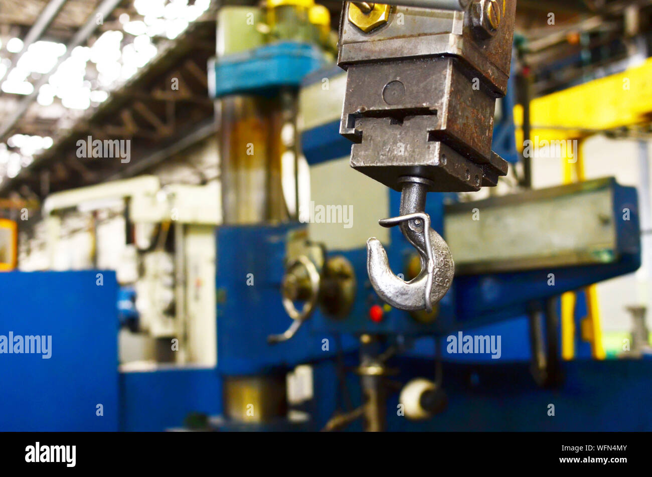 Crane hook of the overhead crane in the workshop of an industrial plant ...