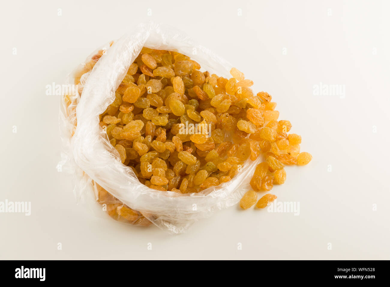 Fresh picked raisins isolated on white background and ready to eat ...