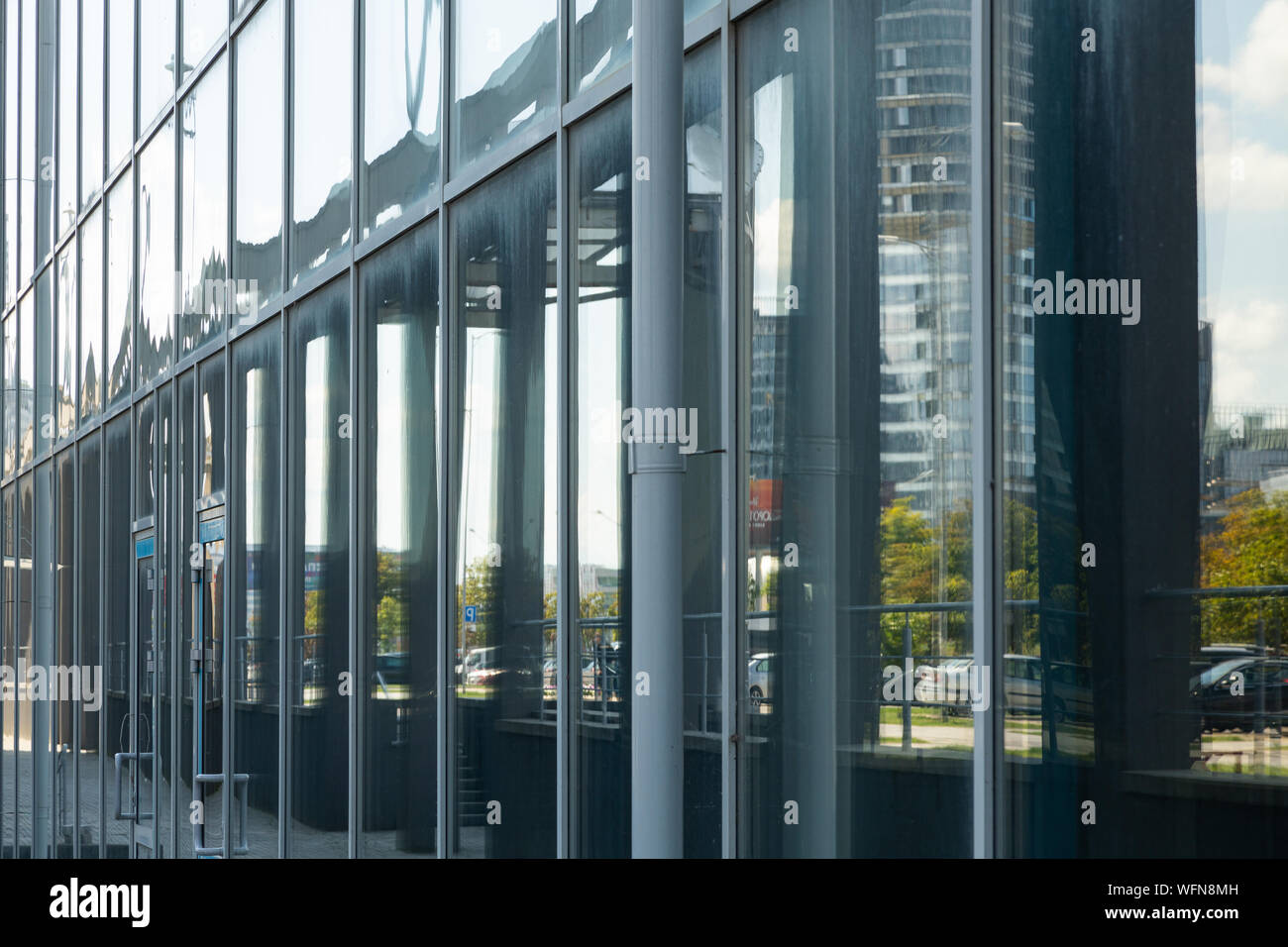 Diagonal view of modern glass facade of office centre building Stock ...