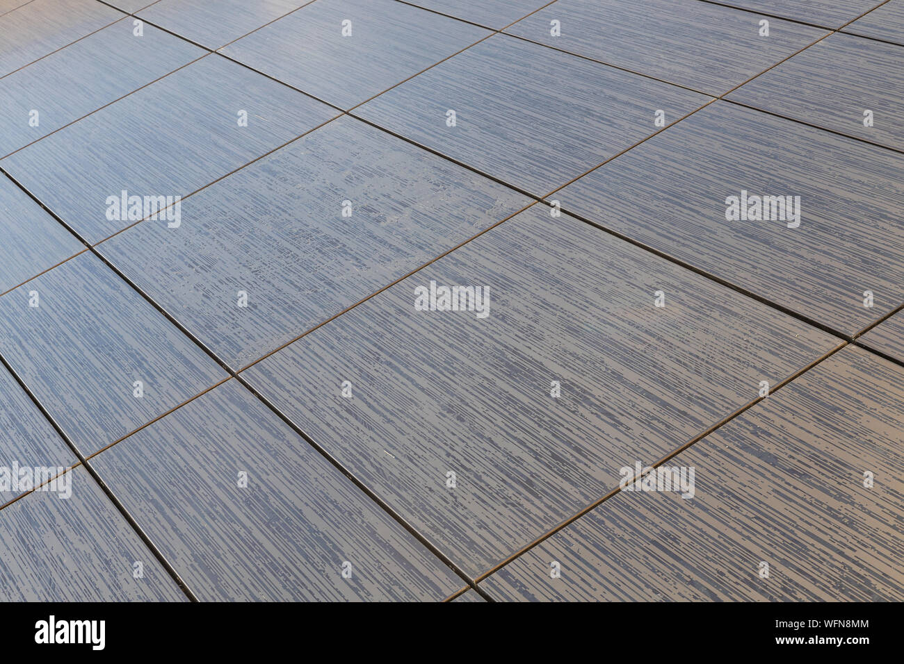 Square brown tiles with small stripe patterns in different sizes for ...