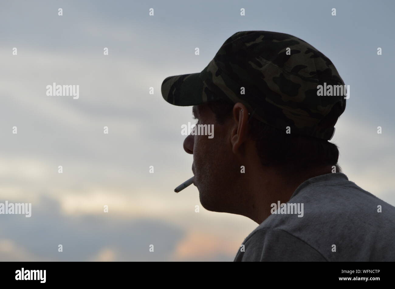 Cap smoking hi-res stock photography and images - Alamy