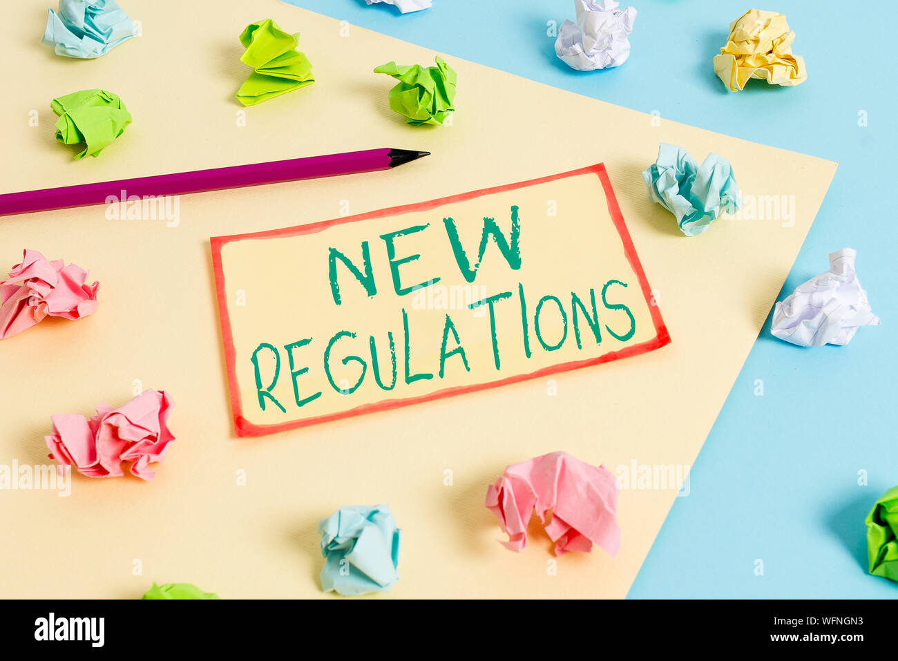 Writing note showing New Regulations question. Business concept for ...