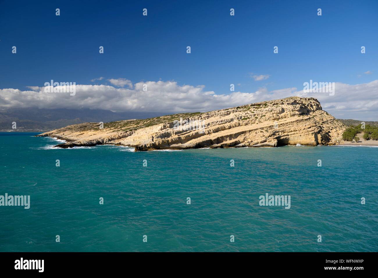 Greece, Crete, Matala, Matala Bay, beach and caves seen from the south ...