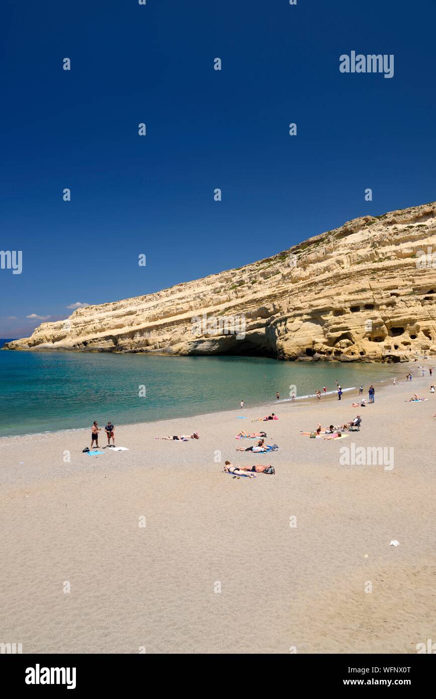 Greece, Crete, Matala, Matala Bay, beach and caves Stock Photo - Alamy