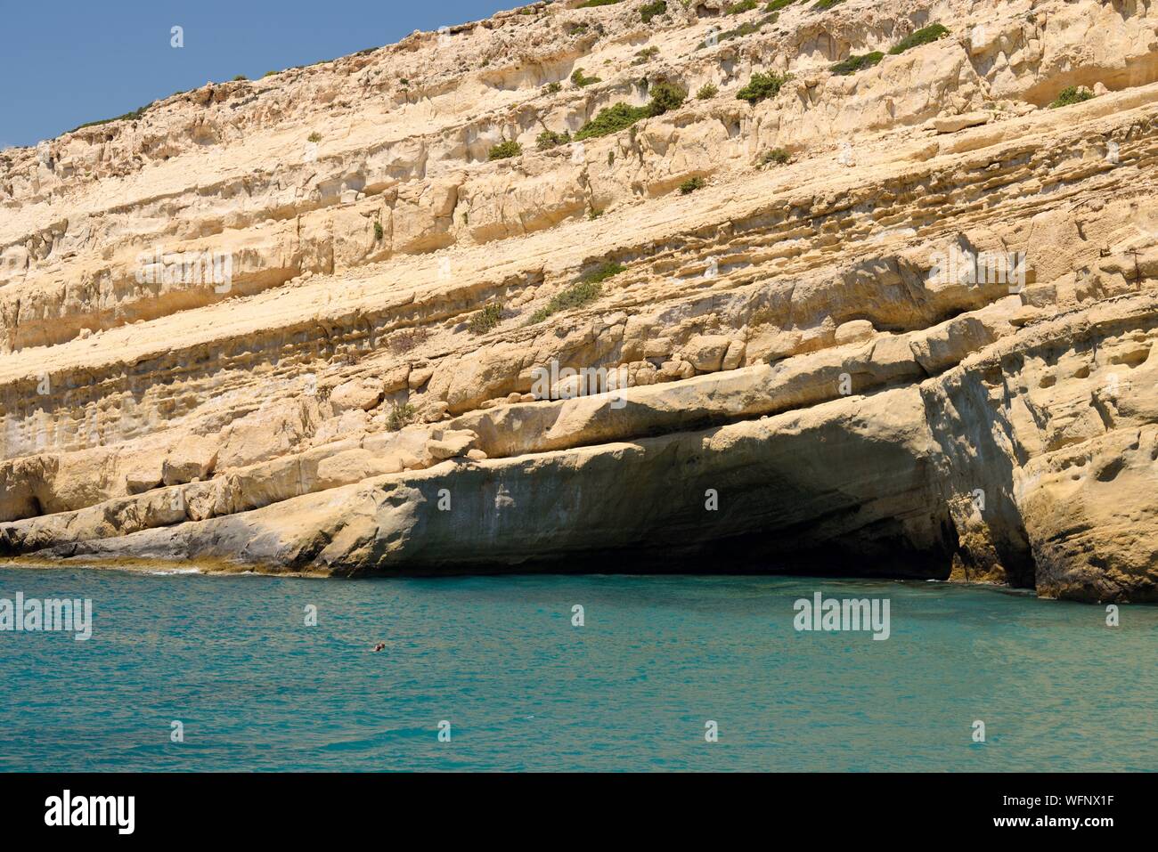 Greece, Crete, Matala, Matala Bay, main cave Stock Photo - Alamy