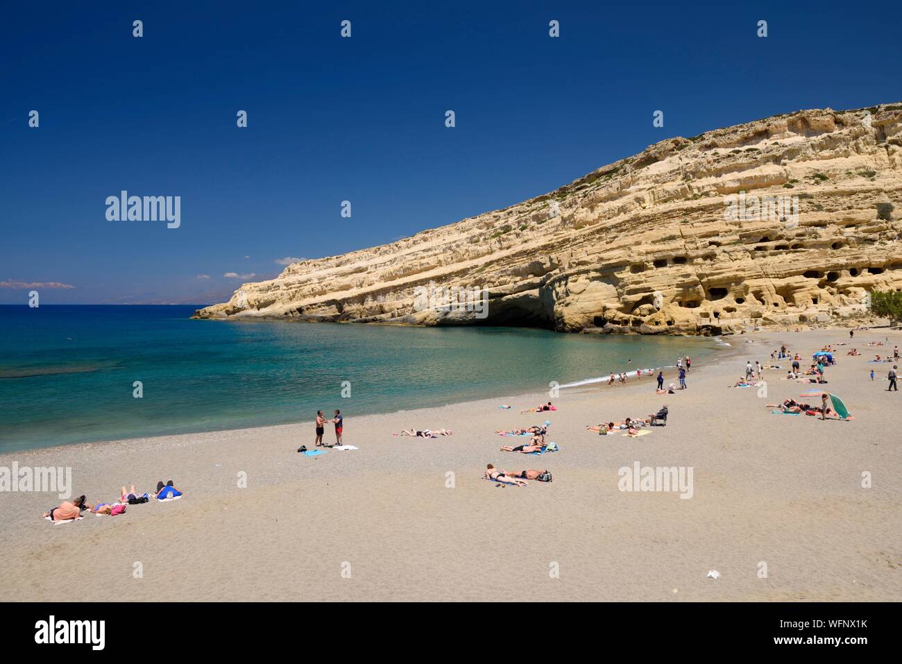Greece, Crete, Matala, Matala Bay, beach and caves Stock Photo - Alamy