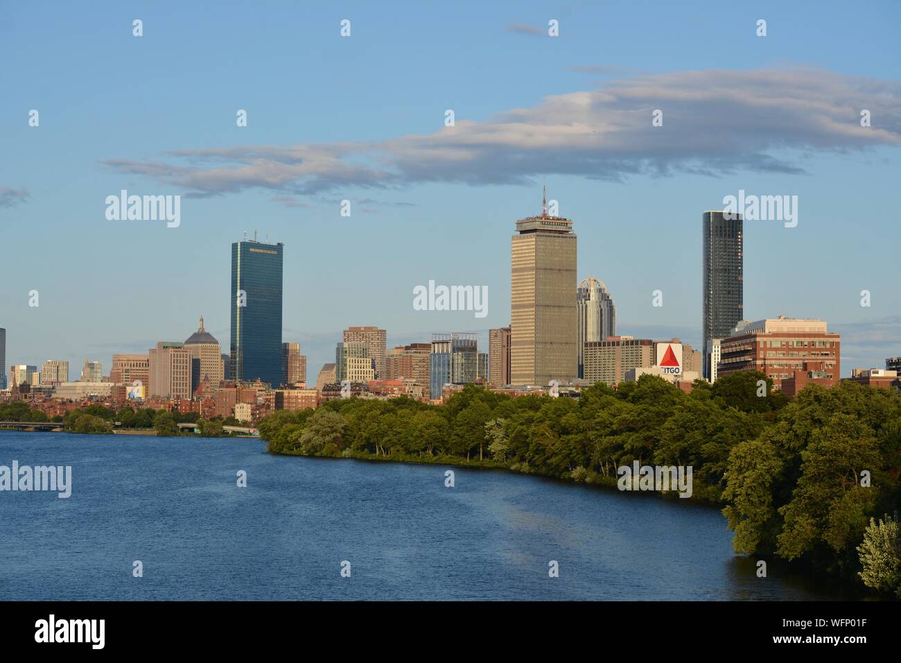 The Boston skyline as seen from across the Charles River at sunset ...