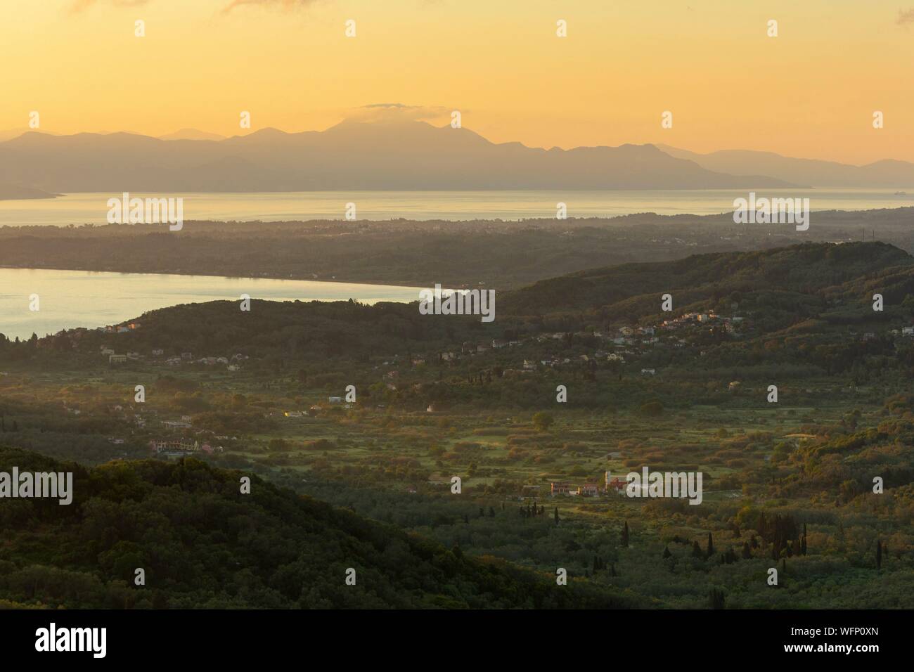 Greece, Ionian Islands, Corfu, the village of Chlomos and at the bottom ...