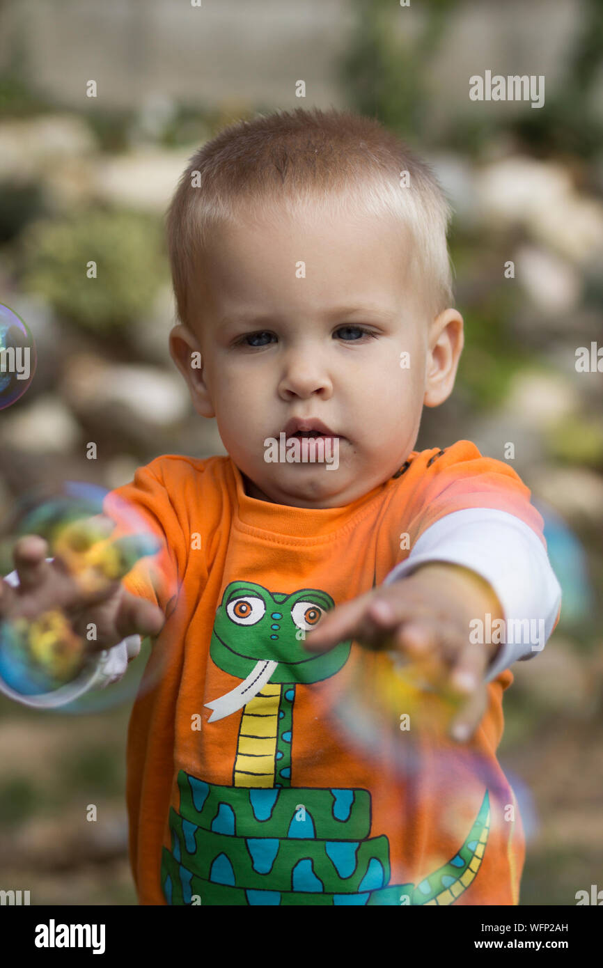 Touching boys hair hi-res stock photography and images - Alamy