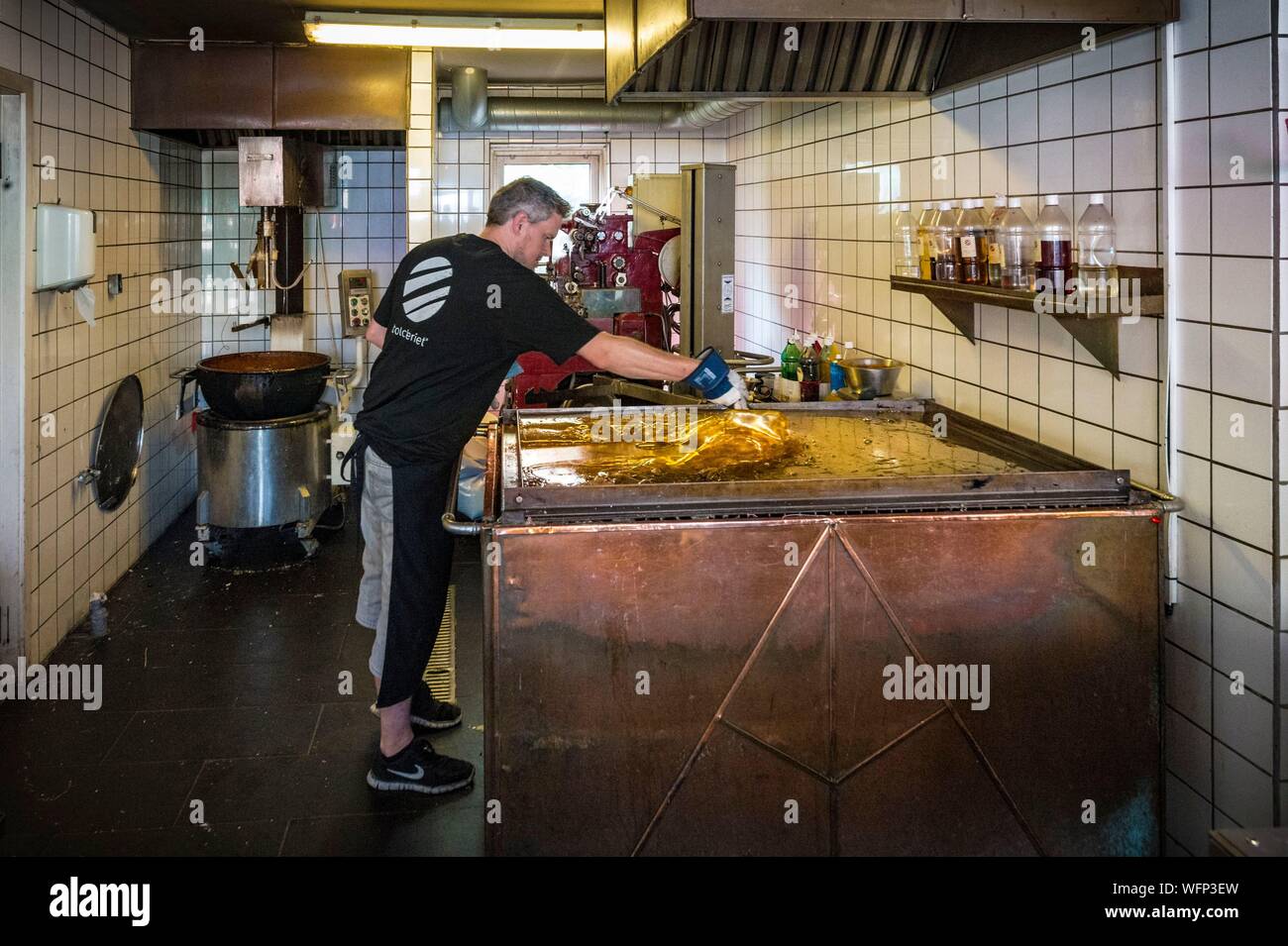 Denmark, Jutland, Skagen, Confectioner Bolcheriet, making hard candies ...