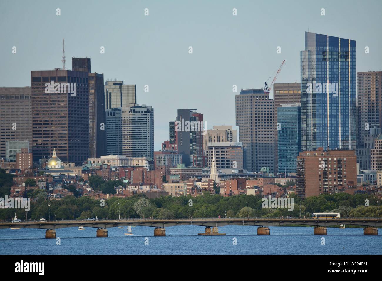 The Boston skyline as seen from across the Charles River at sunset ...