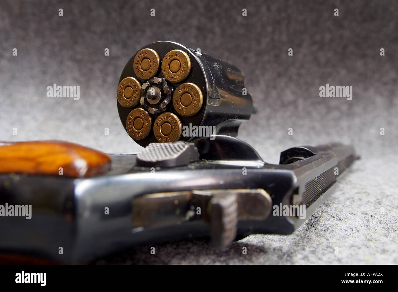 A used long barrel .38 special Taurus revolver gun displayed at a ...