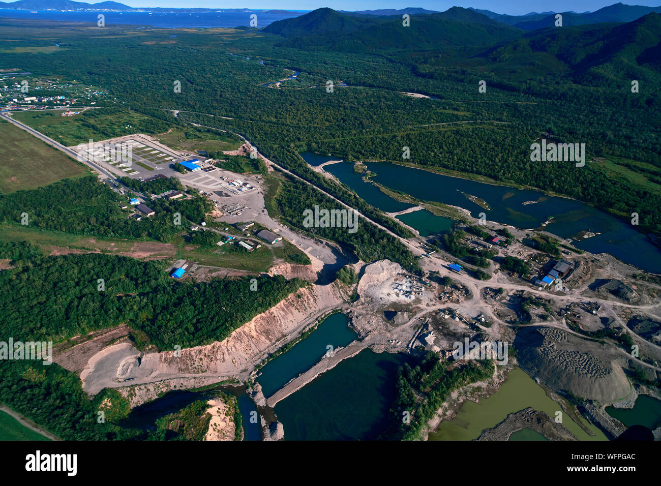 Aerial view over the sandstone quarry. Large Quarry from above during ...