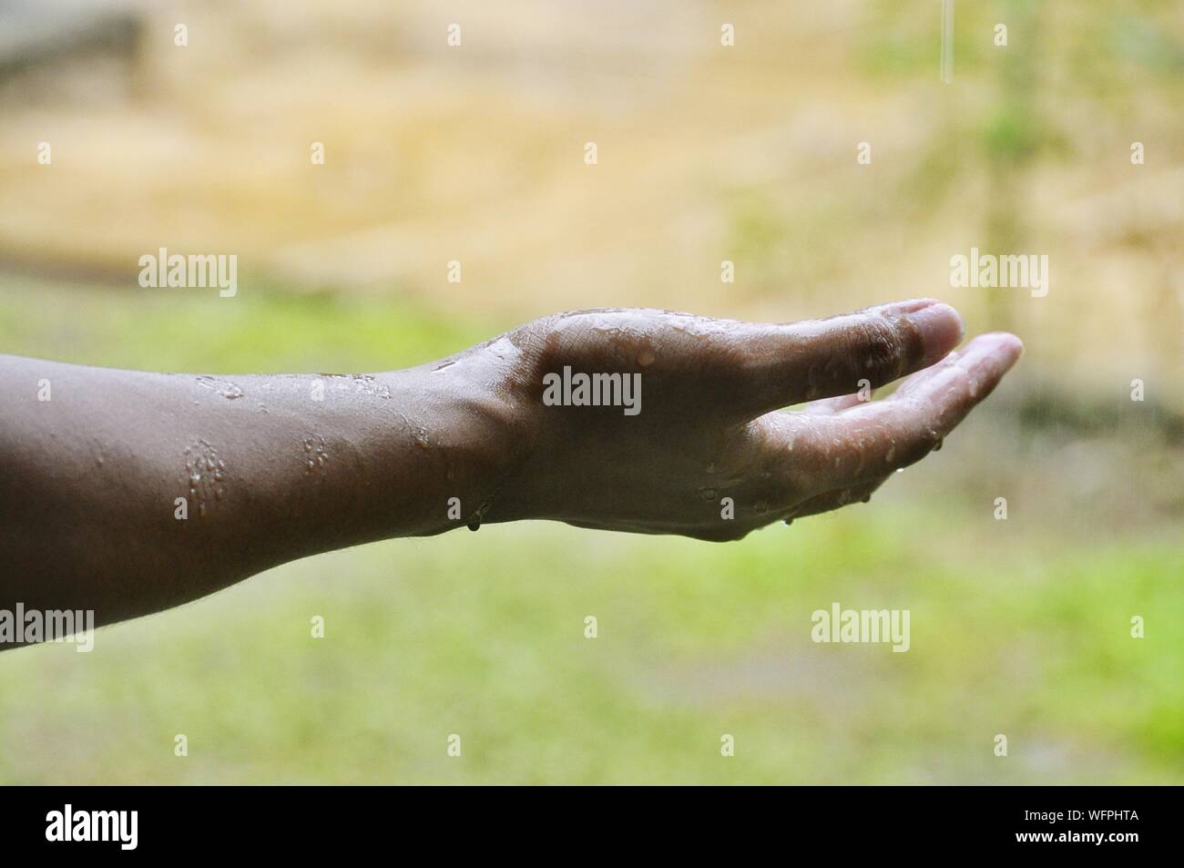 Wet hand hi-res stock photography and images - Alamy