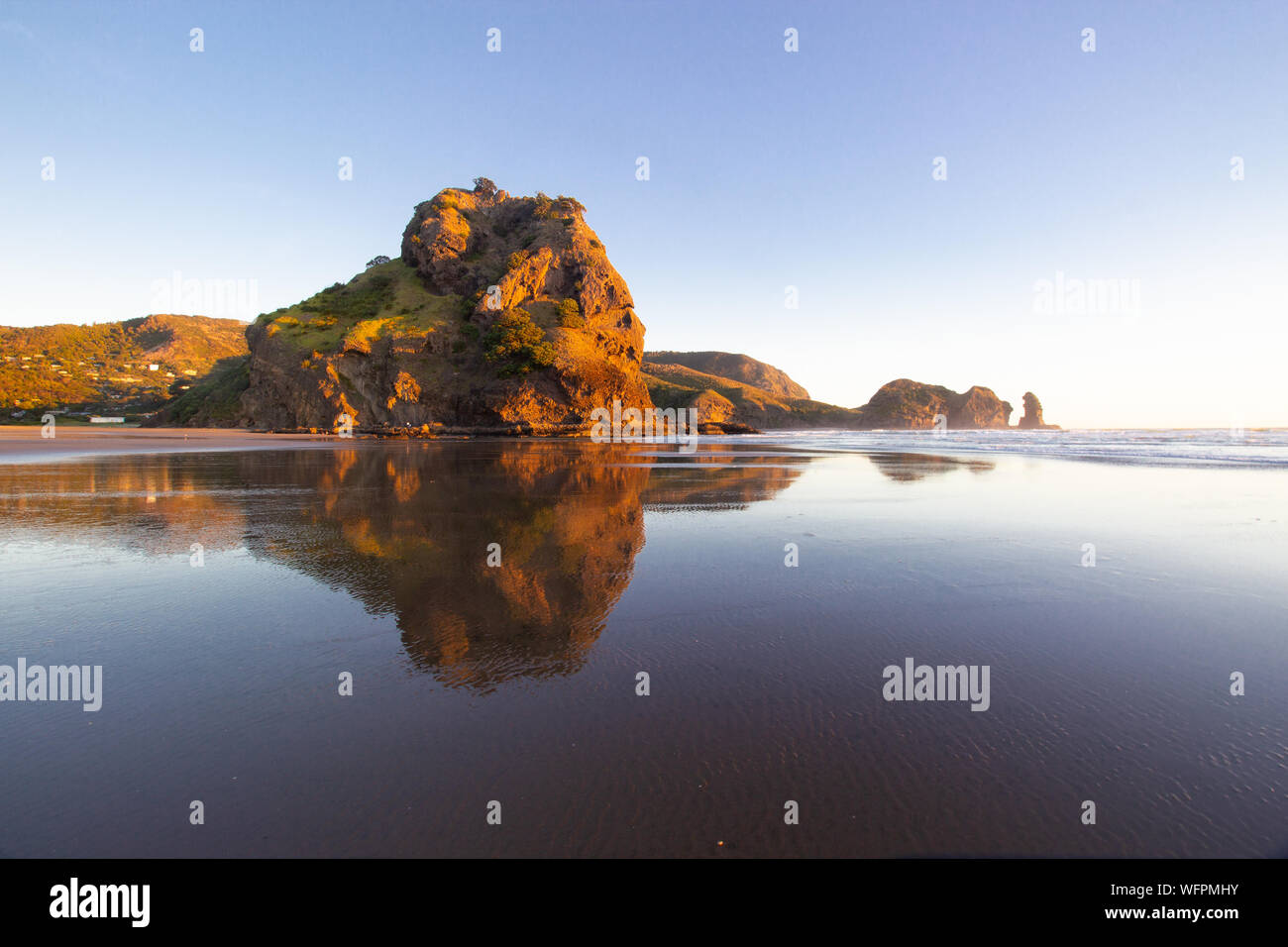 beautiful sunset at Piha beach, New Zealand Stock Photo - Alamy
