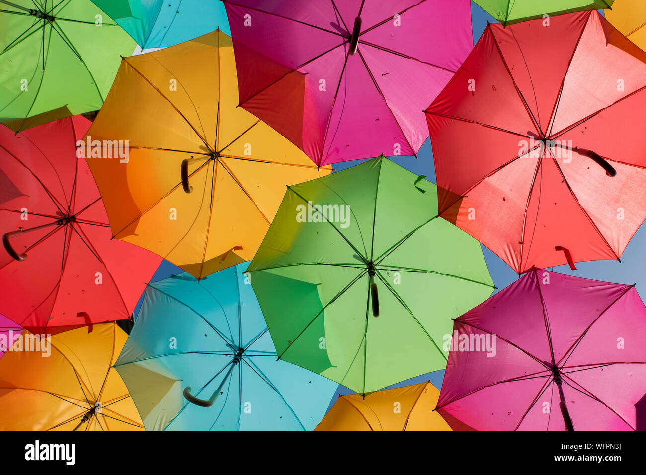 Street with colorful umbrellas in Agueda, Aveiro - Portugal Stock Photo ...