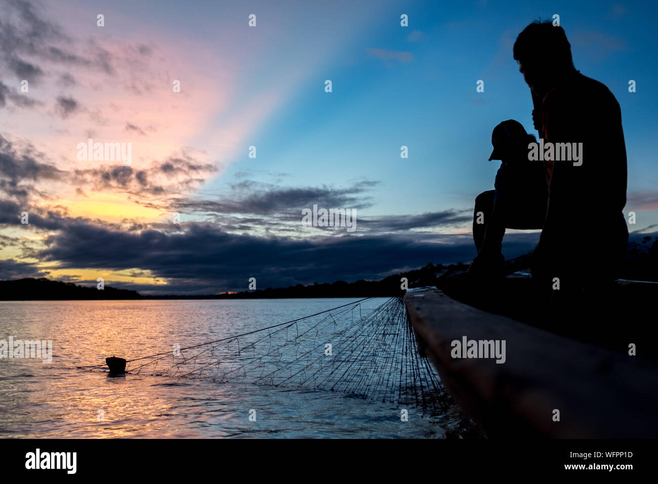 Two men in river catch hi-res stock photography and images - Alamy