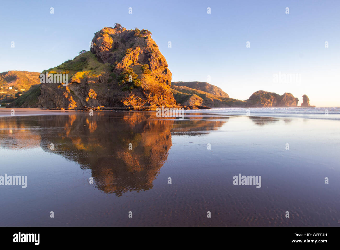 beautiful sunset at Piha beach, New Zealand Stock Photo - Alamy
