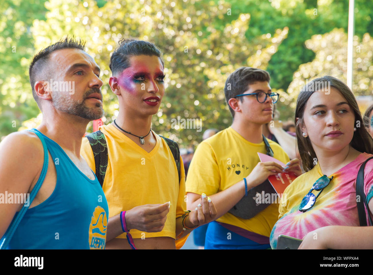 Curious group of friends at Madrid Pride Stock Photo - Alamy