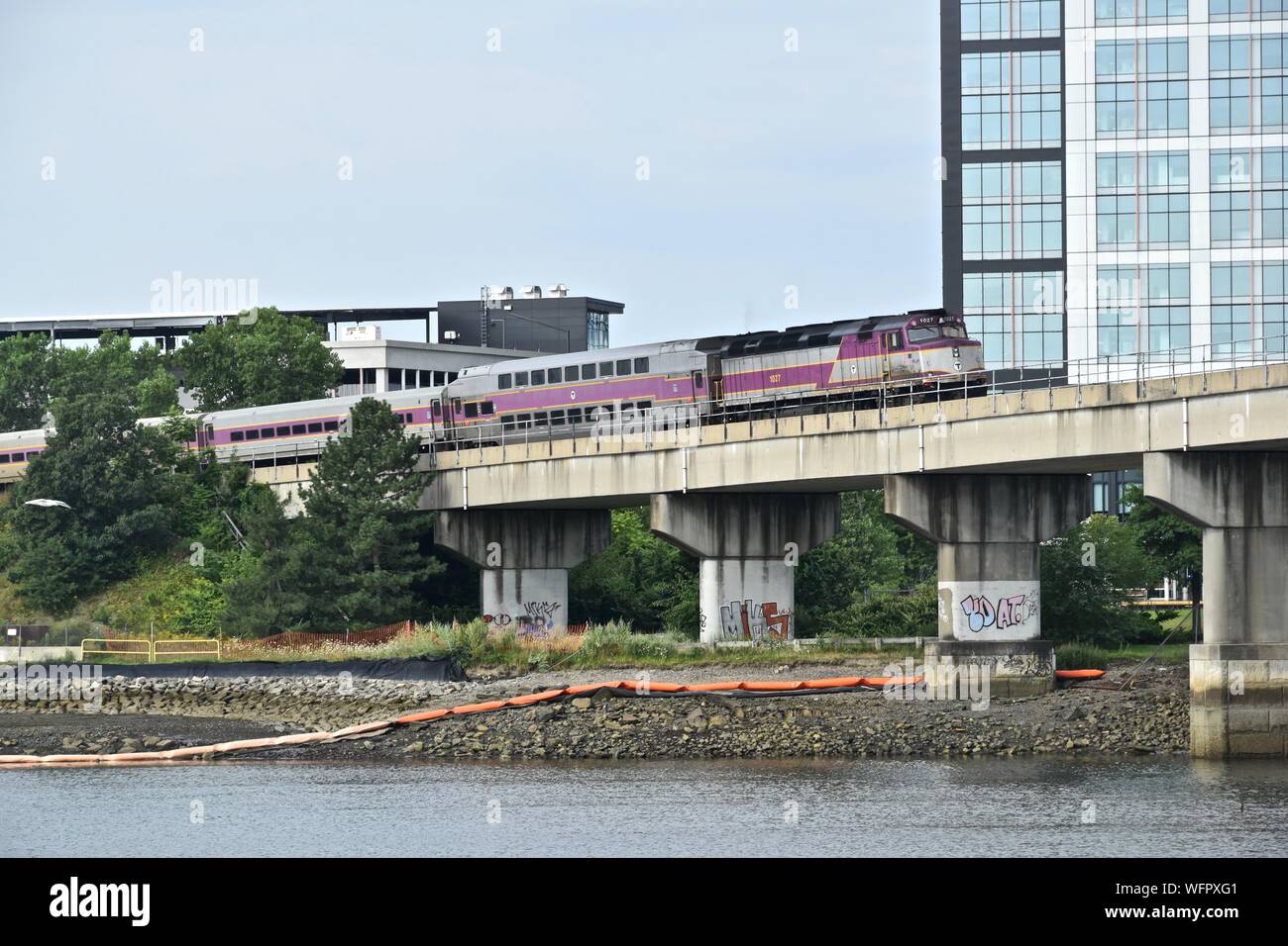 An MBTA Commuter Rail train passing over the Mystic River on the ...