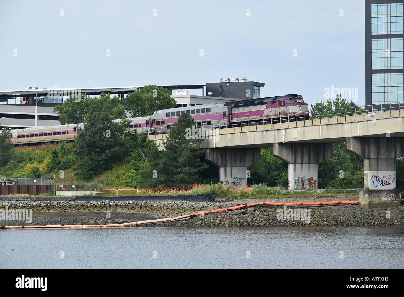 An MBTA Commuter Rail train passing over the Mystic River on the ...