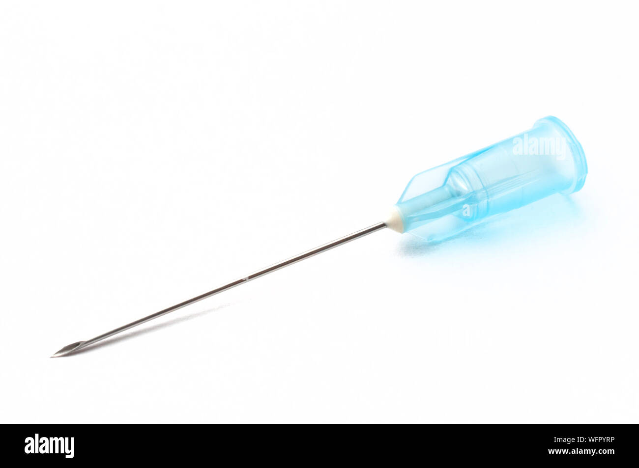 Hypodermic needle on white background. It is used with a siringe to ...