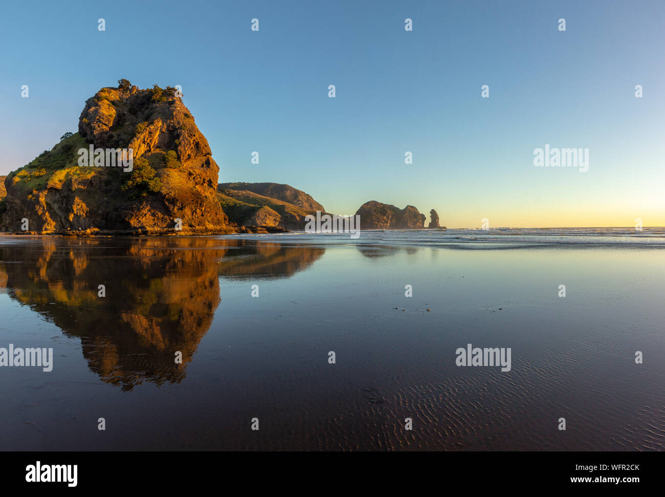 beautiful sunset at Piha beach, New Zealand Stock Photo - Alamy