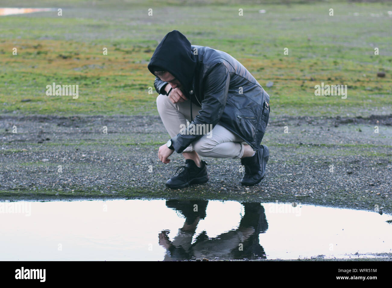 Puddle on black hi-res stock photography and images - Alamy
