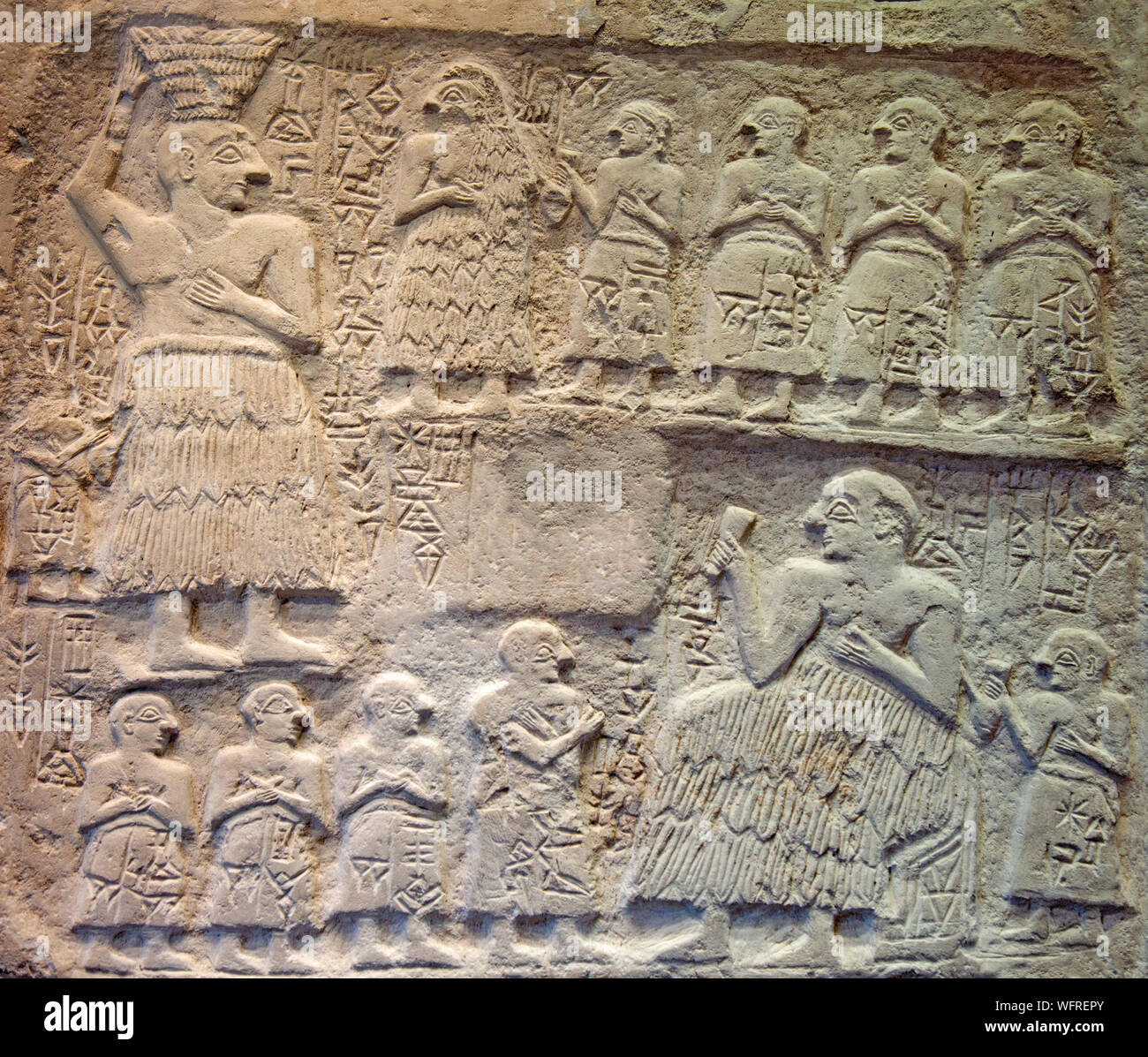 Ancient sumerian stone carving with cuneiform scripting Stock Photo - Alamy