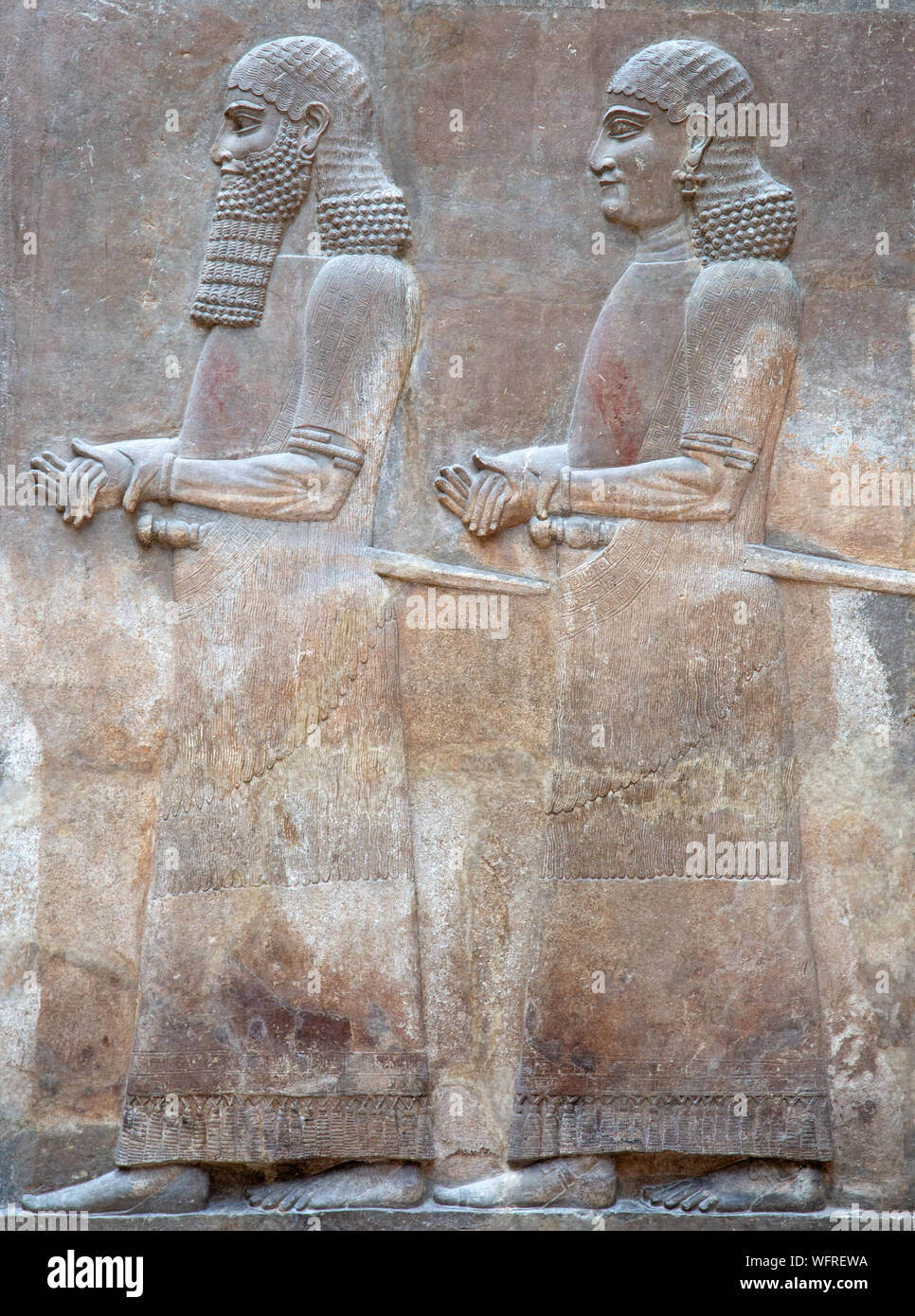 Ancient sumerian stone carving with cuneiform scripting Stock Photo - Alamy