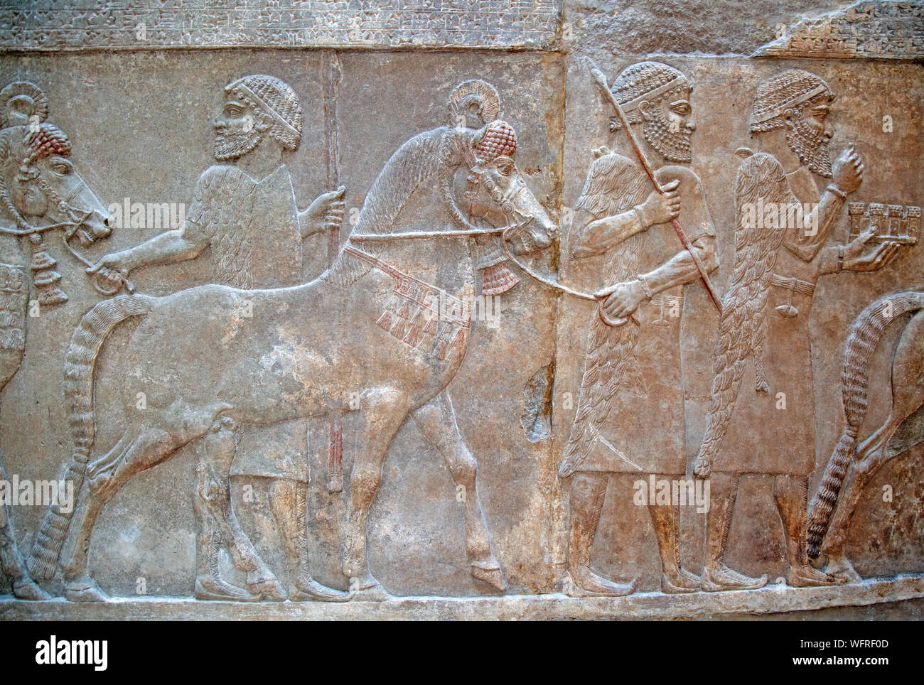 Ancient sumerian stone carving with cuneiform scripting Stock Photo - Alamy