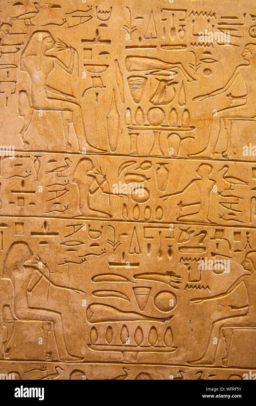 Egyptian hieroglyphs on the wall Stock Photo - Alamy