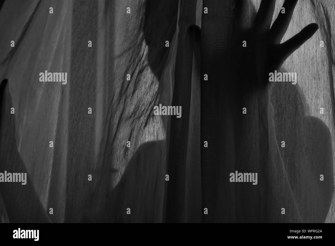 People behind the window Black and White Stock Photos & Images - Alamy