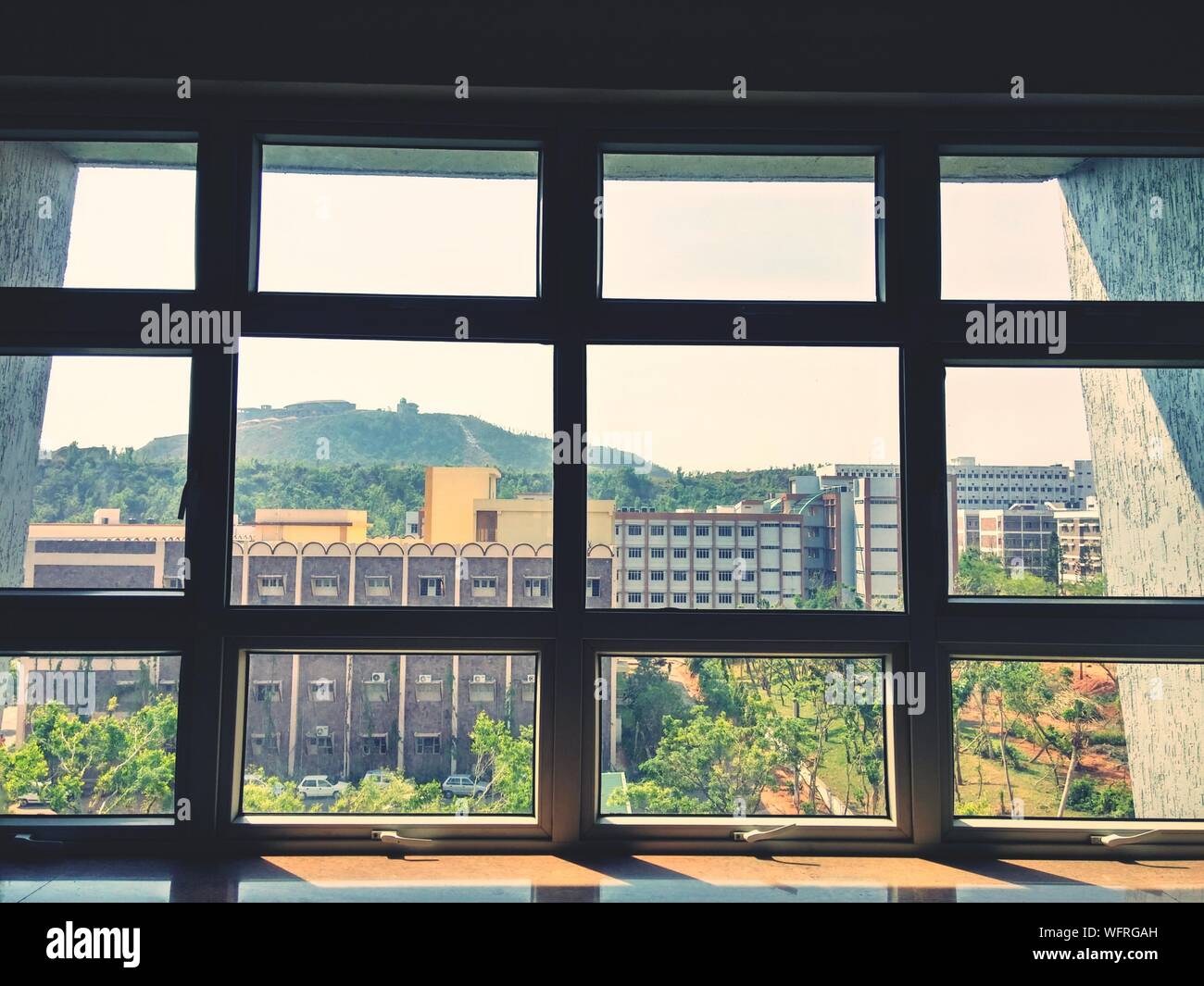 Buildings Seen Through Window Stock Photo - Alamy
