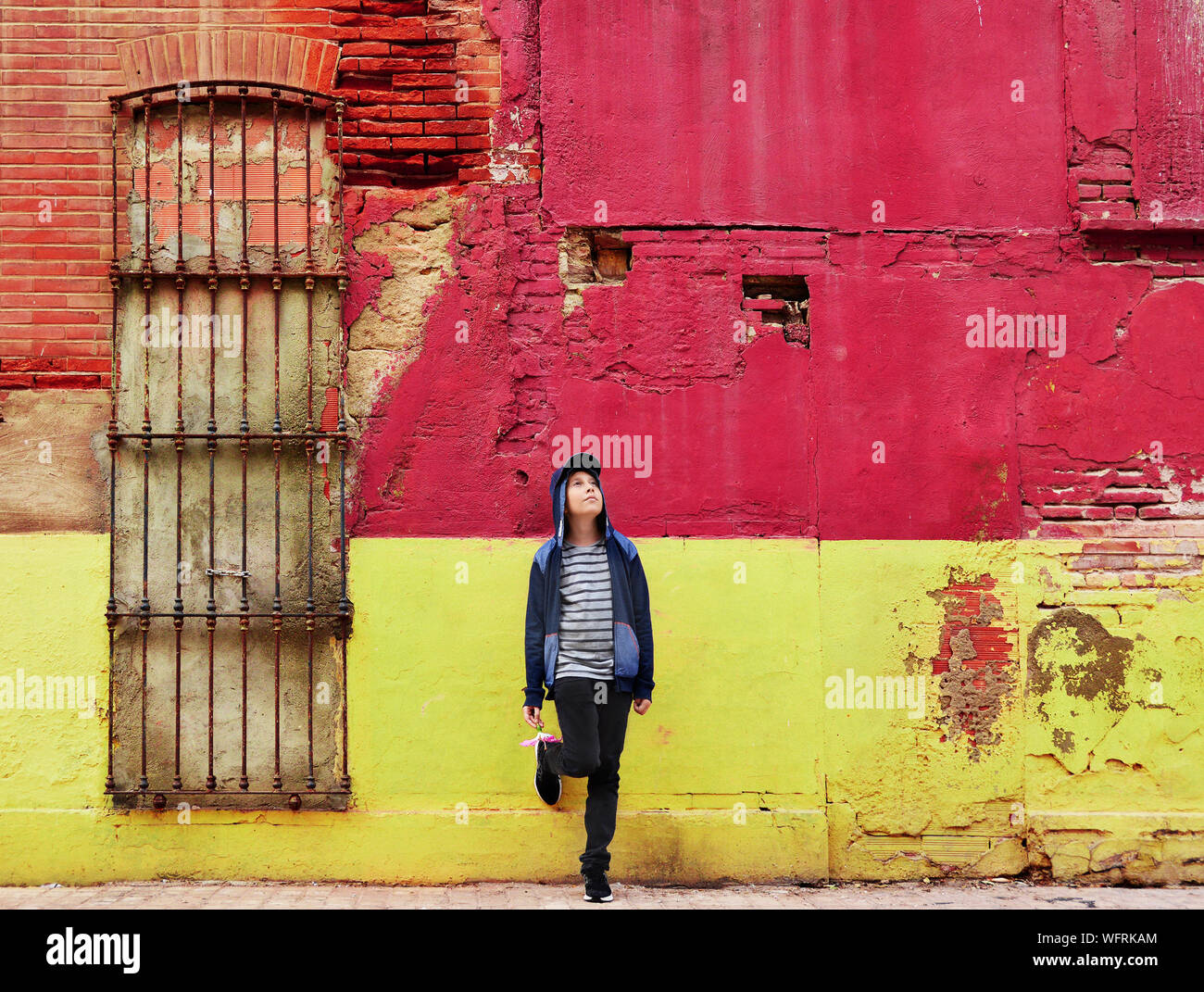 Boy in front building hi-res stock photography and images - Alamy