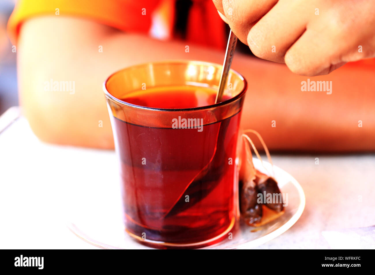 Stirring tea cup hi-res stock photography and images - Alamy
