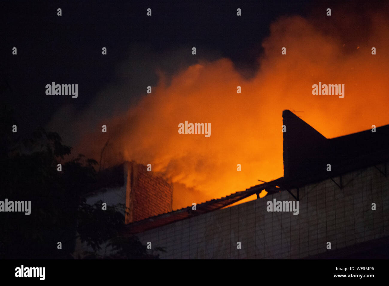 Flame burning destruction building exterior damaged emergencies and ...