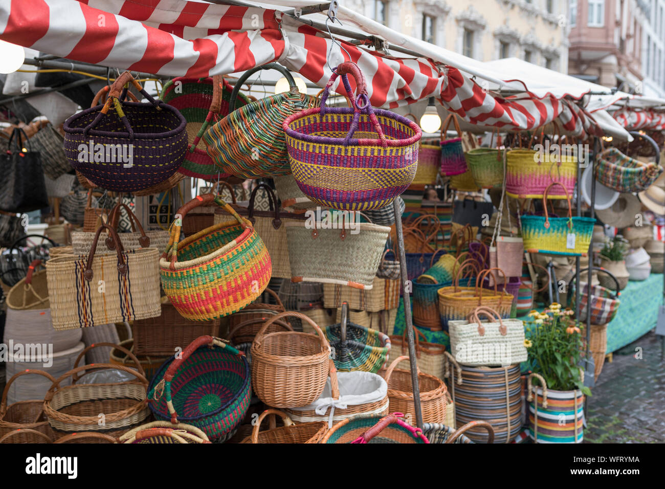 Straw baskets waiting for customers at the market of Würzburg, Germany ...